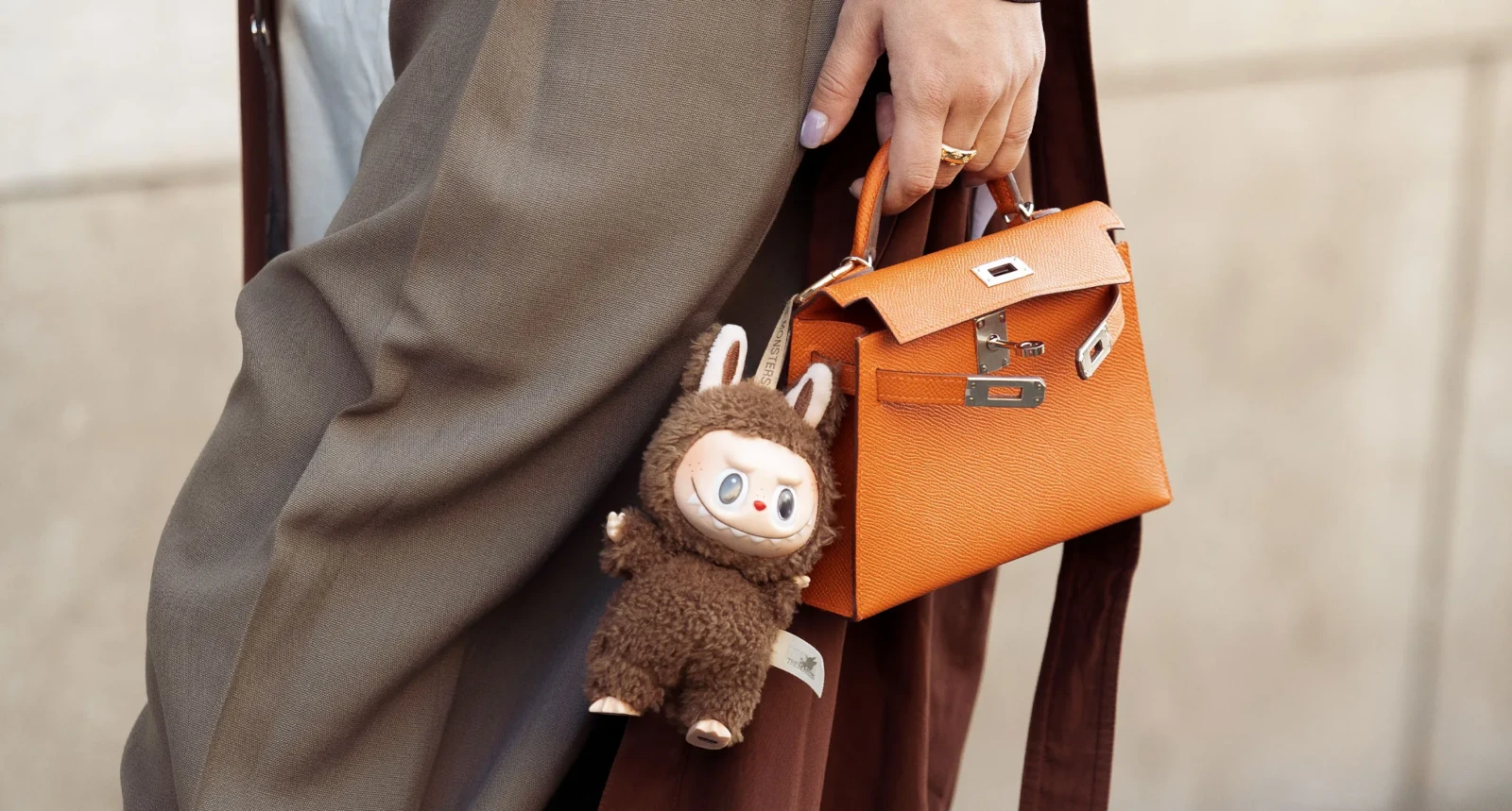 Charm Offensive: Why (And Which) Bag Charms Are Everywhere Right Now ...